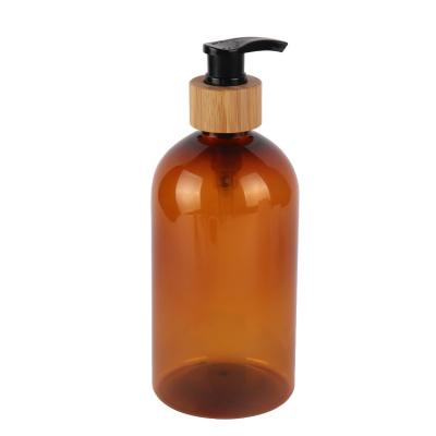 Cina 200 ml 300 ml 500 ml Bottiglia ricaricabile di lozione Amber con pompa di lozione di bambù naturale in vendita