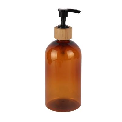 Cina 200 ml 300 ml 500 ml Bottiglia ricaricabile di lozione Amber con pompa di lozione di bambù naturale in vendita