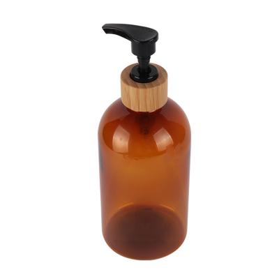 Cina 200 ml 300 ml 500 ml Bottiglia ricaricabile di lozione Amber con pompa di lozione di bambù naturale in vendita