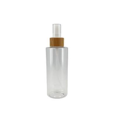 China Portable Cosmetic Spray Bottle 100ml Perfume Sprayer With Plastic And Bamboo Lid for sale