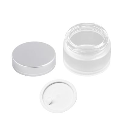 Cina Bottone di crema cosmetica rotondo da 20 g Bottone di crema di vetro ghiacciato trasparente con coperchio di plastica argento in vendita