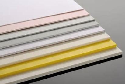 Finished plastic sheets being prepared for packaging
