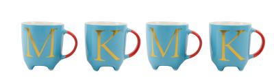 China Color Block Gold Monogram Ceramic Mug, Light Blue Three-Legged Base Initial Letter Coffee Cup with Red Handle for sale