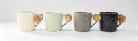 China Wavy Textured Silver Handle Solid Color Ceramic Coffee Mug for sale