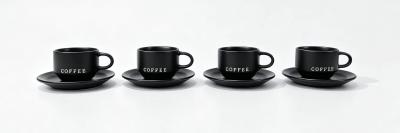 China 4 Pack Matte Black COFFEE Letter Ceramic Cup & Saucer Sets, Short Wide Belly Espresso Latte Mugs, Minimalist Monochrome Coffee Tableware Combo for Café & Modern Home Gift for sale