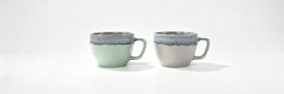 China Collection Overview This 2-piece tall  ceramic mug set features delicate frosted speckled reactive glaze, covered with scattered white snowflake dot textures that fade lightly at the cup rim f for sale