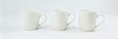 China 6‑Piece Embossed White Ceramic Mug Set, Assorted Textured Solid‑Color Coffee Mugs for sale