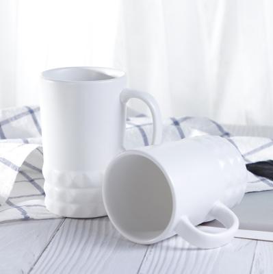 China Wholesale high quality embossed shape golden handle white coffee mug ceramic mug for sale