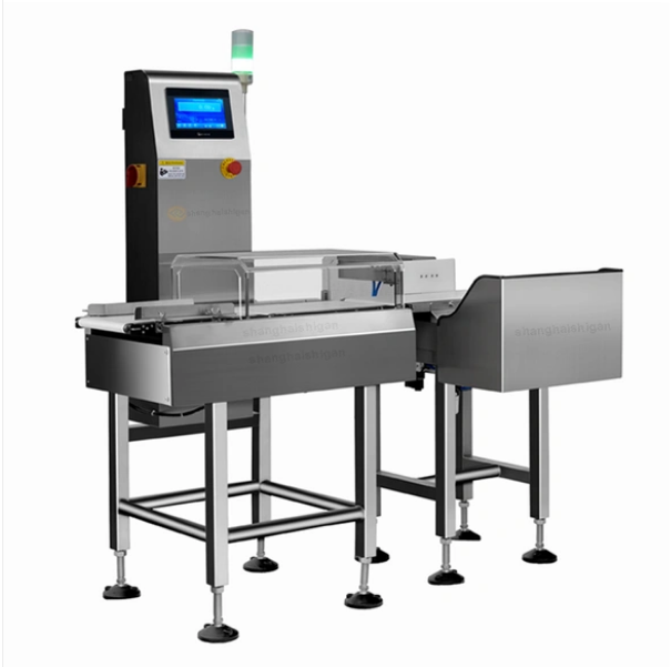Modern checkweigher in manufacturing line