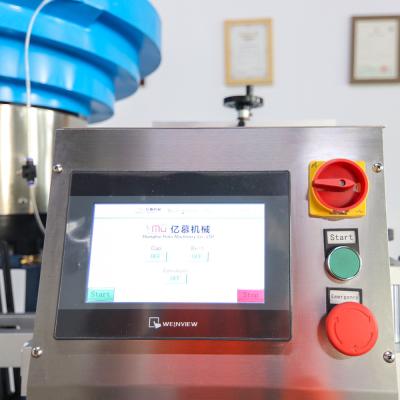 China Automatic Cap Installer 30 - 130mm Bottle Diameter Four Wheel Capping Machine for sale