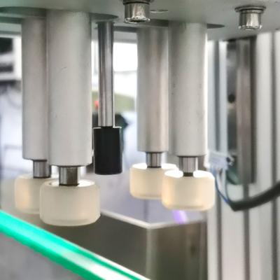 China Automatic Cap Installer 30 - 130mm Bottle Diameter Four Wheel Capping Machine for sale
