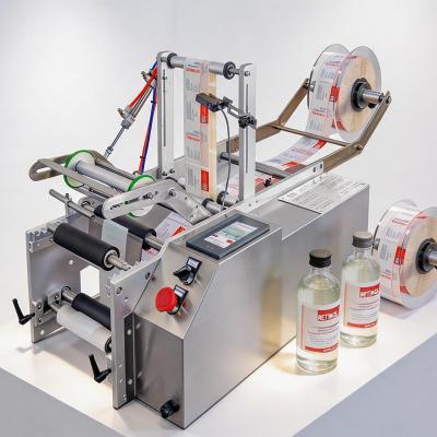 China Round Bottle Labeling Machine Desktop Semi-automatic Glass Plastic Bottle Label Printing Machine With CE Certification for sale