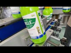 Machine d'étiquetage auto-adhésif automatique pour bouteille de boisson à eau ronde