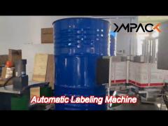 yimu automatic labeling machine for 200l drums with 300kg capacity and 600 drums/hour output