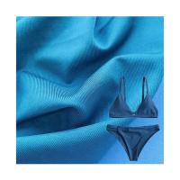 China 85 Polyester 15 Spandex Ankara Swimwear Fabric 142cm Width 170-240gsm Elastane Waterproof for sale