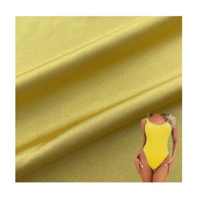 China 4 Way Spandex Lycra Textured Swimwear Fabric Custom Shiny Waterproof for sale
