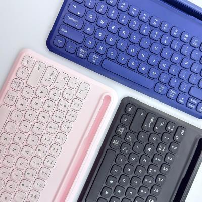 China In Stock UK/US Layout Multi-Device BT Wireless Keyboard with Built-in Stand for IPad Tablet & iPhone Compact Design for sale