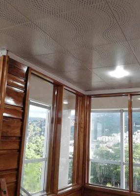 China CE Acoustic Ceiling Tiles White Color Wave Perforation Aluminium Clip In Ceiling For Hotel for sale