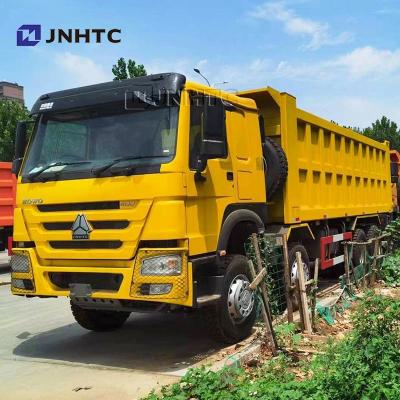 China Sinotruk Howo Tipper Dump Truck 8x4 Driving Type Specifications 30 Ton for sale
