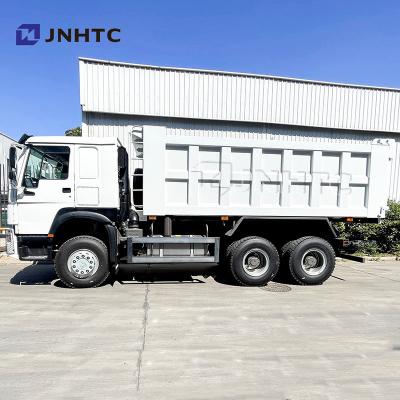 China HOWO Preço Pesado 6 por 4 camião de descarga usado Novo 20 Cbm 300HP-450HP 10Wheels Tipper Dump Trucks à venda