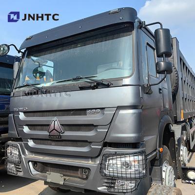 China Novo HOWO 7 8x4 12 rodas 30m3 50tons Euro 3 Lifting frontal caminhão de descarga pesado à venda
