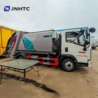 China HOWO Garbage Truck 4X2 5CBM 105CBM Garbage Trash Compactor Garbage Truck for sale