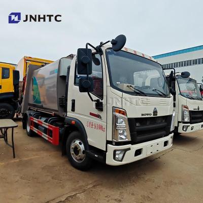 China HOWO Garbage Truck 4X2 5CBM 105CBM Garbage Trash Compactor Garbage Truck for sale