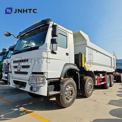 China HOWO caminhão de desvio 8x4 8x8 condução 371hp 400hp 12 rodas diesel camião de descarga à venda