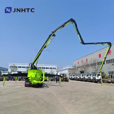 Cina Sinotruk Pesante 47m 6X4 Montato Pompa di calcestruzzo camion con miscelatore a disco idraulico in vendita