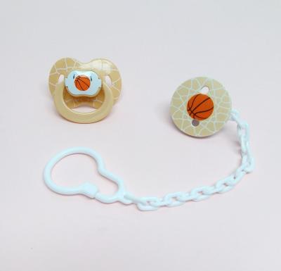 China Corrente líquida de Soother do bebê do basquetebol do ABS do silicone à venda