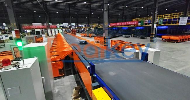 Narrow Belt Sorter in operation showing parcel sorting