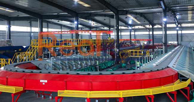 Close-up view of cross belt sorter mechanism showing precision sorting