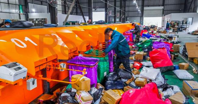 Close-up view of cross belt sorter mechanism and components