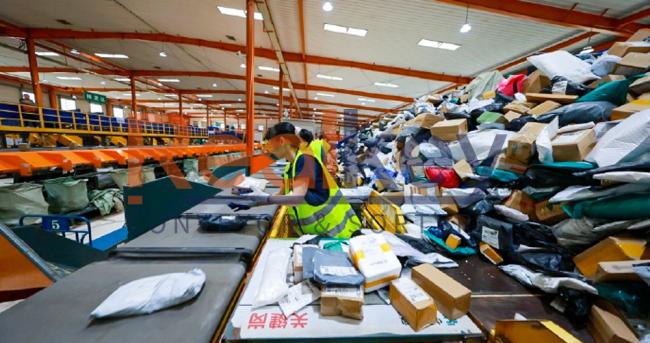 Precision Crossbelt Sorter in operation