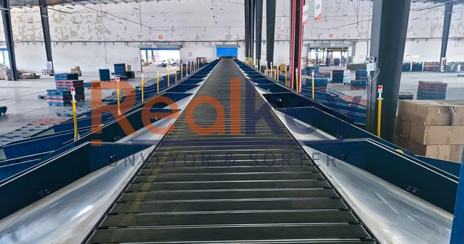 Realkey Narrow Belt Sorter in operation showing parcel sorting process