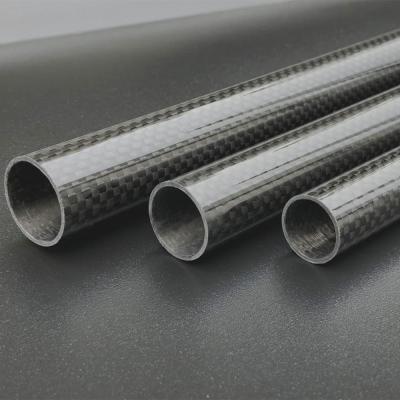 China Roll Wrapped Carbon Fiber Tube with T700 Equivalent Carbon Fiber for High Strength-to-Weight Ratio and Thermal Stability for sale