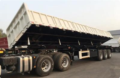 China CIMC mechanical suspension Dual air brake system payload 70T allows goods to be unloaded from the side Tri-axle Tipper Trailer for sale