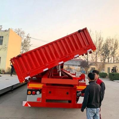 China CIMC mechanical suspension Dual air brake system payload 70T allows goods to be unloaded from the side Tri-axle Tipper Trailer for sale