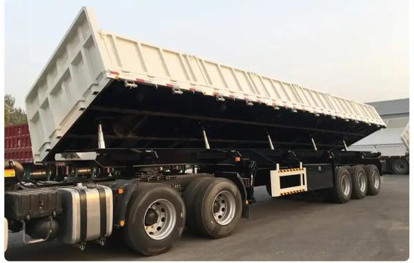 CIMC Tri asse Side Tipper 70 tonnellate consente di scaricare le merci dal lato di trasporto di materiali da costruzione scarico semirimorchio