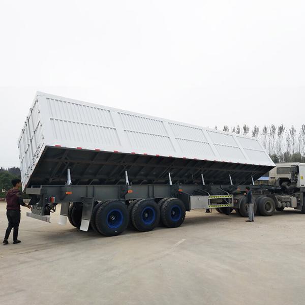 CIMC Tri asse Side Tipper 70 tonnellate consente di scaricare le merci dal lato di trasporto di materiali da costruzione scarico semirimorchio