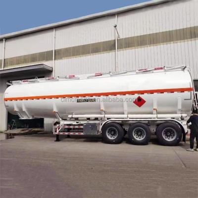 China The latest process design of CIMC is a three-axis liquid medium semi-trailer made of high-strength steel. for sale