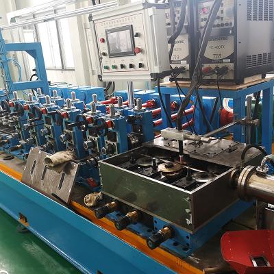 China Nanyang Spiral Pipe Making Welded Steel Square Pipe Roll Forming Machine with Cold Cutting Saw Cutting System for sale