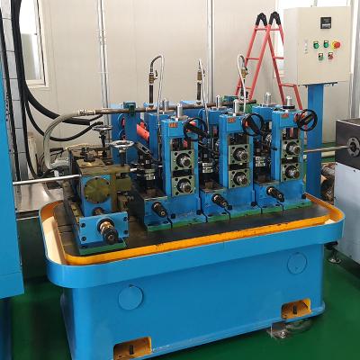 China Nanyang Spiral Pipe Making Welded Steel Square Pipe Roll Forming Machine with Cold Cutting Saw Cutting System for sale