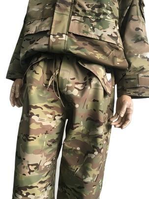Military tactical jacket and pants set in use
