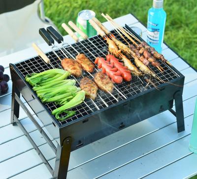 Cina griglia di campeggio piegante portatile all'aperto del carbone della griglia del barbecue della griglia di 35*27*19.5cm piccola in vendita
