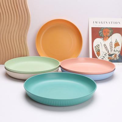 China 9 Inch Round Plastic Dinner Plate Lightweight Wheat Plates for Reusable Diningware for sale