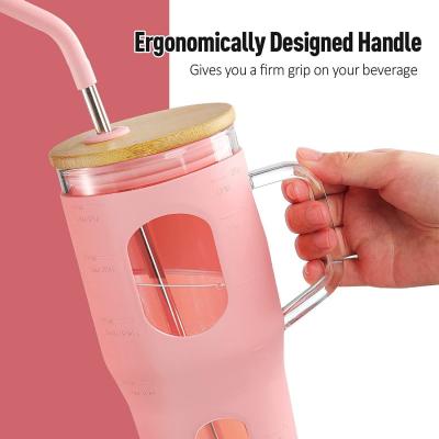 China Custom Logo Reusable Glass Tumbler 32oz with Bamboo Lid Handle and Silicone Sleeve for sale