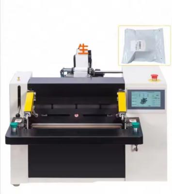 China DFD40I Bags Sealing And Labeling Machine Automatic Express Bag Packer Ecommerce Bagging Systems Packing Machine Auto Bagger for sale