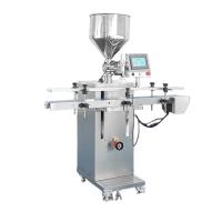 China Plastic Packaging Material Vertical Paste Filling Machine With Conveyor And Touch Screen Easy Operation for sale