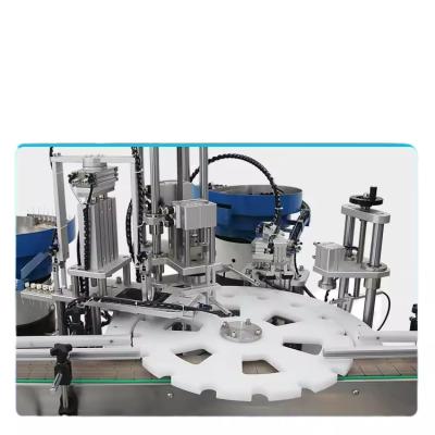 中国 高速自動生産ライン 香水ノズルの縛りとプラスチックボトルキャップを押すキャピングマシン 販売のため